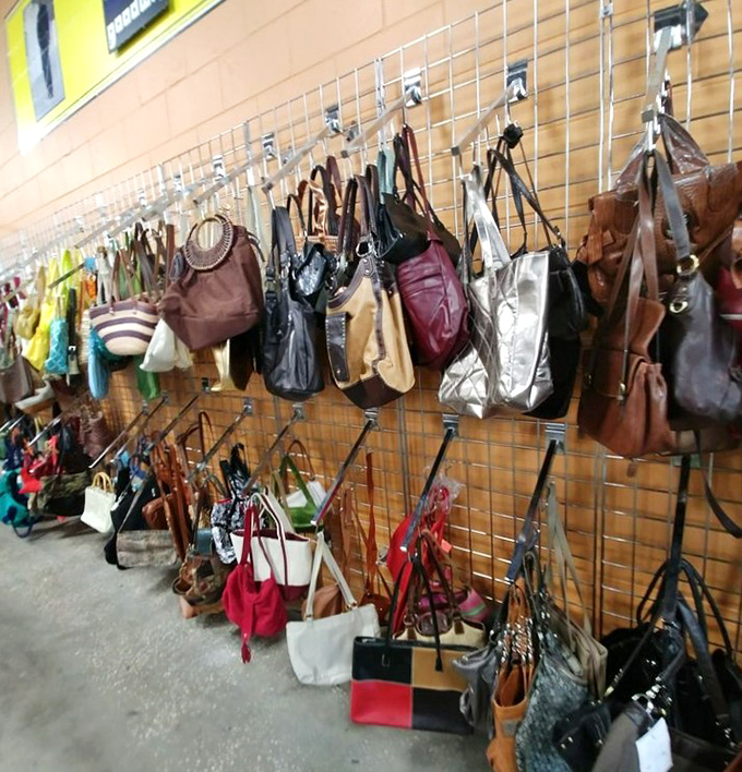 The handbag wall&mdash;where last season's designer splurges meet their second-chance soulmates. That burgundy leather tote is practically calling your name!
