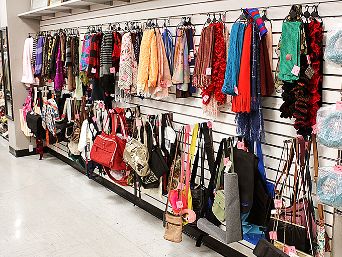 The accessories wall—where yesterday's designer bags and vibrant scarves await their second act in someone's wardrobe rotation.