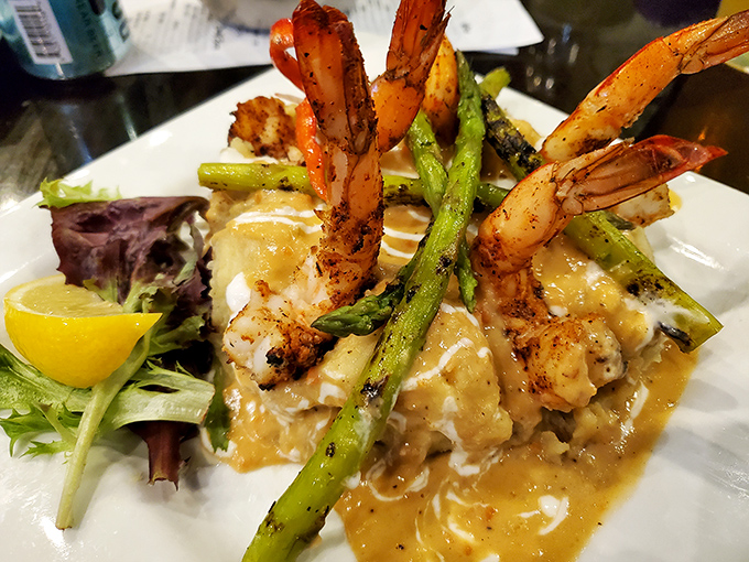 Shrimp standing at attention like they're proud to be part of this masterpiece. The sauce pools beneath like a flavor moat protecting a risotto castle.