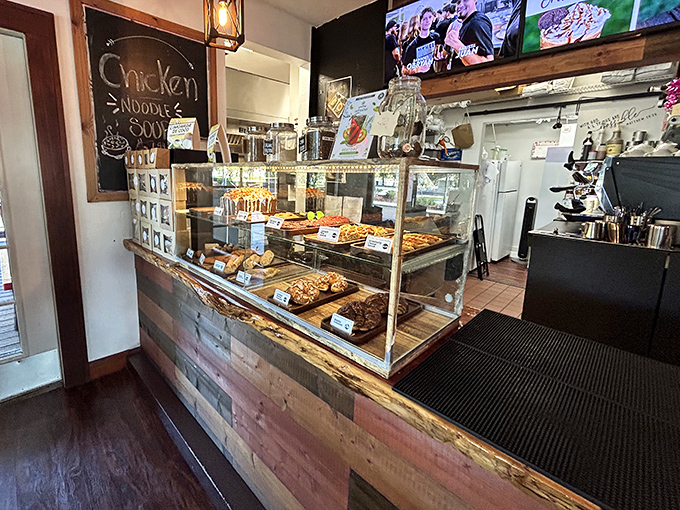 The pastry case—that glass-enclosed temple of temptation where willpower goes to die and "I'll just have a bite" becomes a beautiful lie.