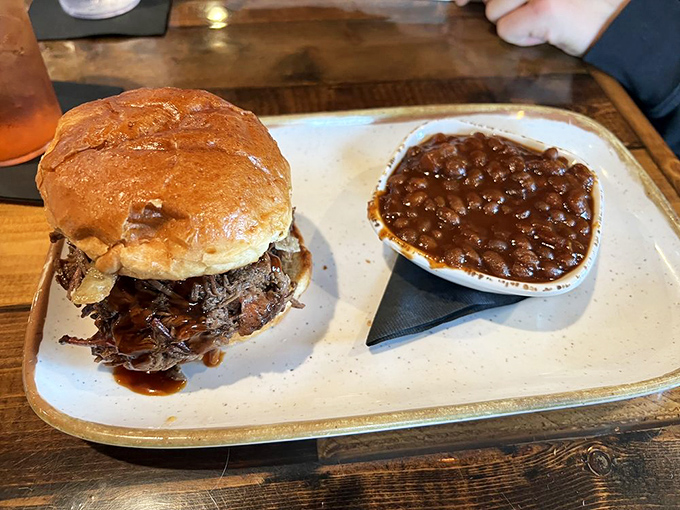 A pulled meat sandwich with baked beans that aren't just a side dish &ndash; they're making a compelling argument to be the main event.