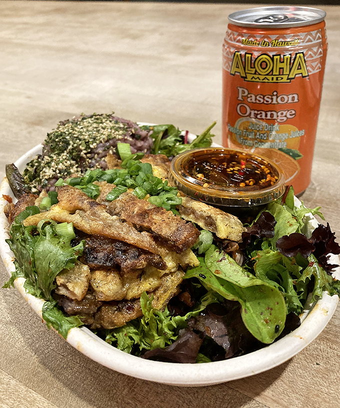 The beef plate that makes you question every other lunch you've ever had—tender kalbi-style slices with that perfect char alongside purple rice and fresh greens.