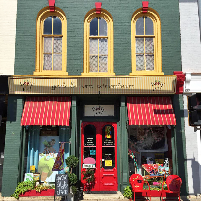 This green storefront with golden arched windows isn't selling lottery tickets&mdash;it's offering something better: the chance to find something perfectly unnecessary.