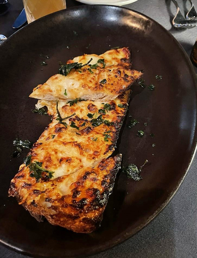 This isn't just cheese toast; it's the kind of elevated comfort food that makes you question why you ever eat anything else.