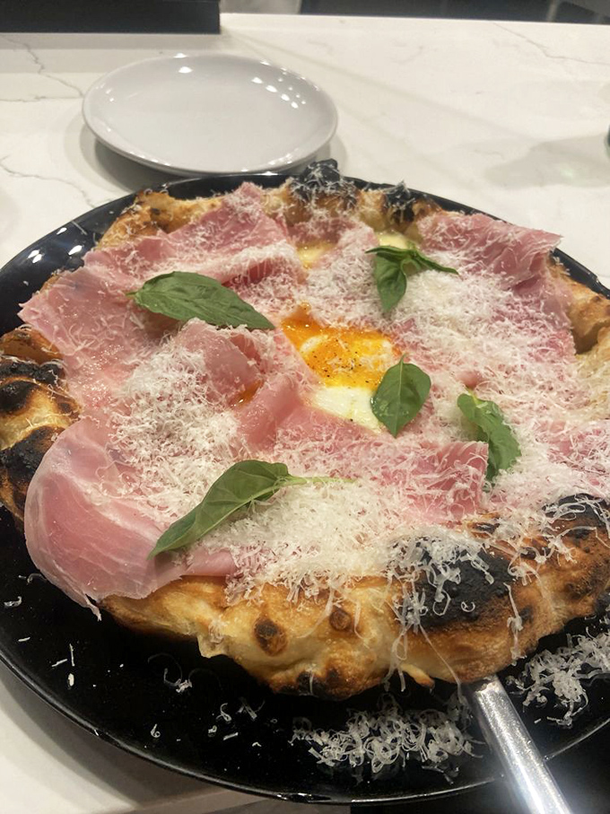 The Bismarck pizza&mdash;where prosciutto and egg create a breakfast-dinner mashup that makes you question why we even have meal categories.