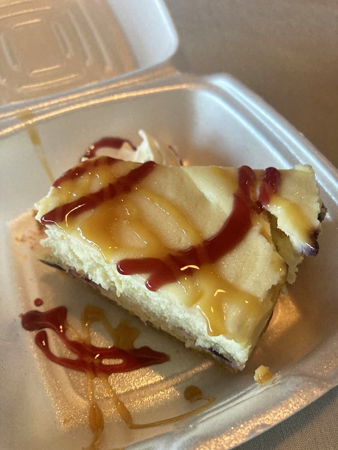 Cheesecake that makes you question all your dessert loyalties. That caramel drizzle is performing culinary magic tricks.