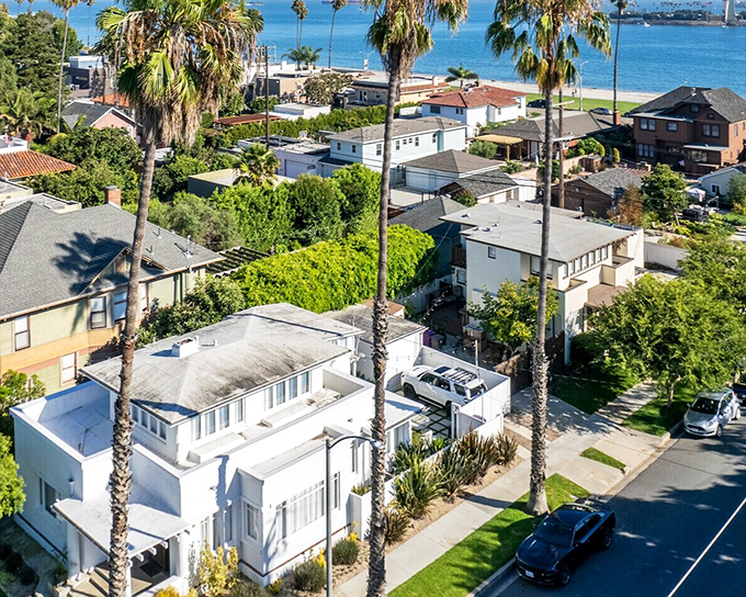 Bluff Park's palm-dotted neighborhoods offer a glimpse into coastal living where mid-century modern meets Mediterranean revival just steps from the Pacific.