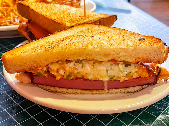 The Texas toast sandwich &ndash; golden, buttery bread embracing a colorful medley of fillings. A handheld masterpiece that requires both hands and several napkins.