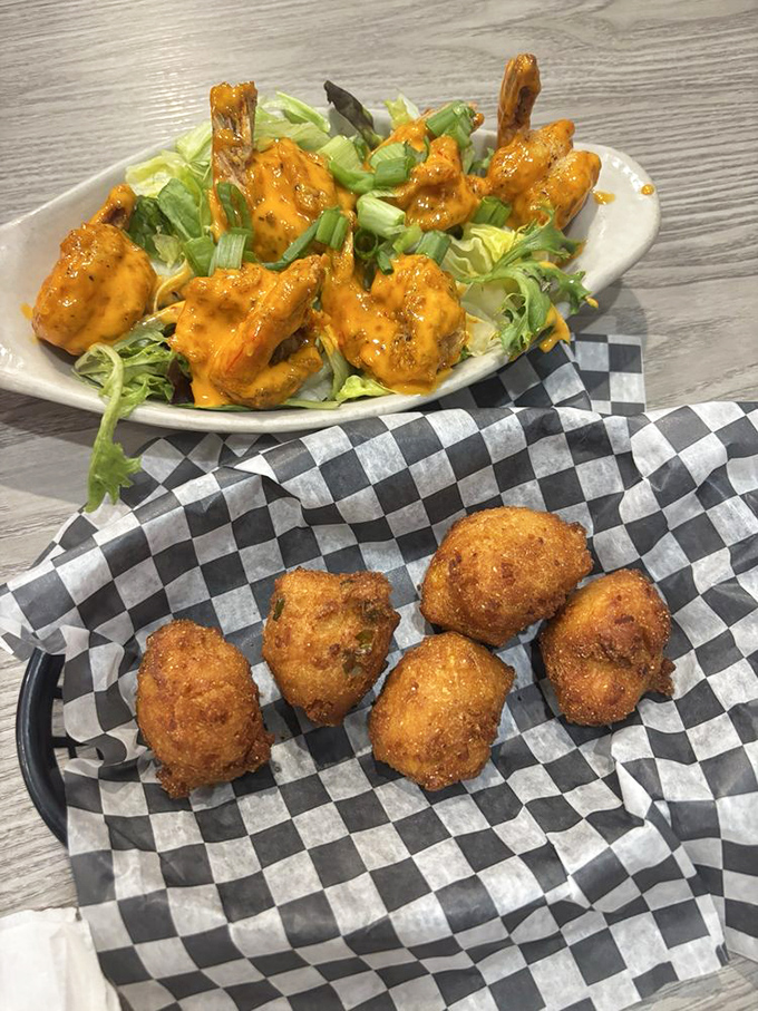 Boom Boom Shrimp bringing the heat while hush puppies stand by for flavor rescue. It's a culinary dynamic duo.