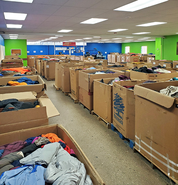 The cardboard armada—each box a floating island of possibility. What Narnia of forgotten fashion awaits in these depths?