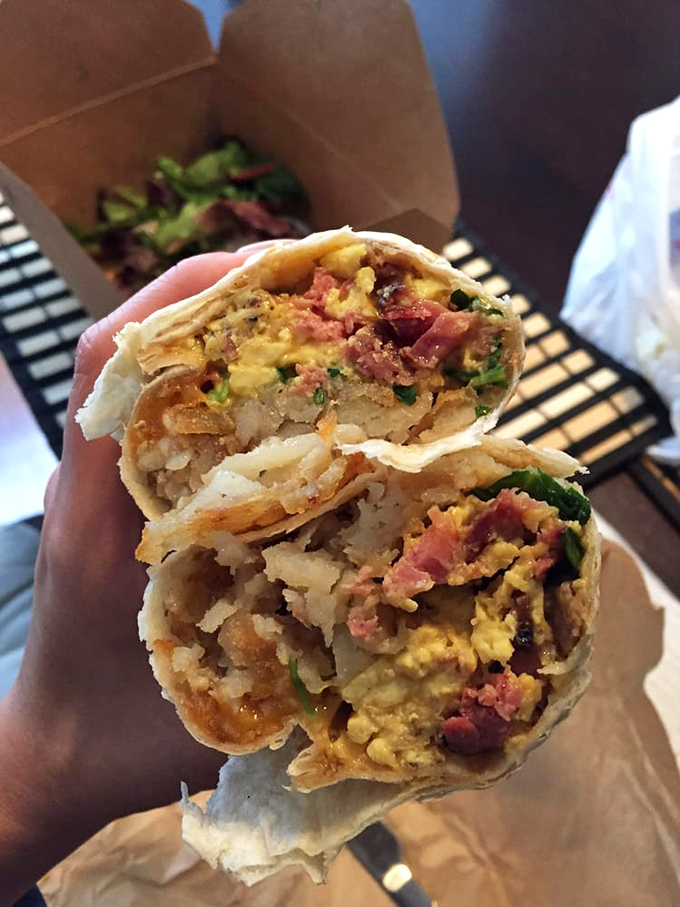 Breakfast burritos should always be this stuffed. A handheld masterpiece packed with potatoes, eggs, and savory goodness.