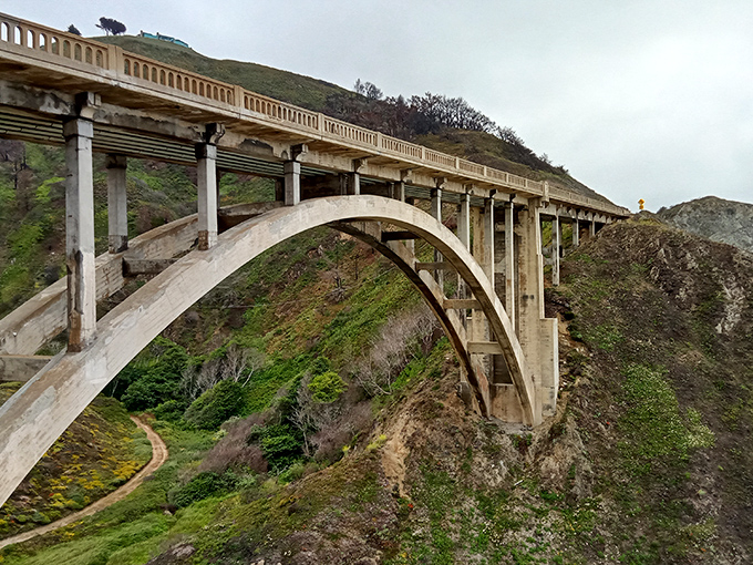 Bixby Bridge—the architectural supermodel of Highway 1. This concrete masterpiece has starred in more car commercials and selfies than any bridge has a right to.