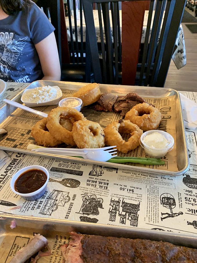 The onion rings deserve their own zip code, while the brisket shows what happens when meat meets time and respect.