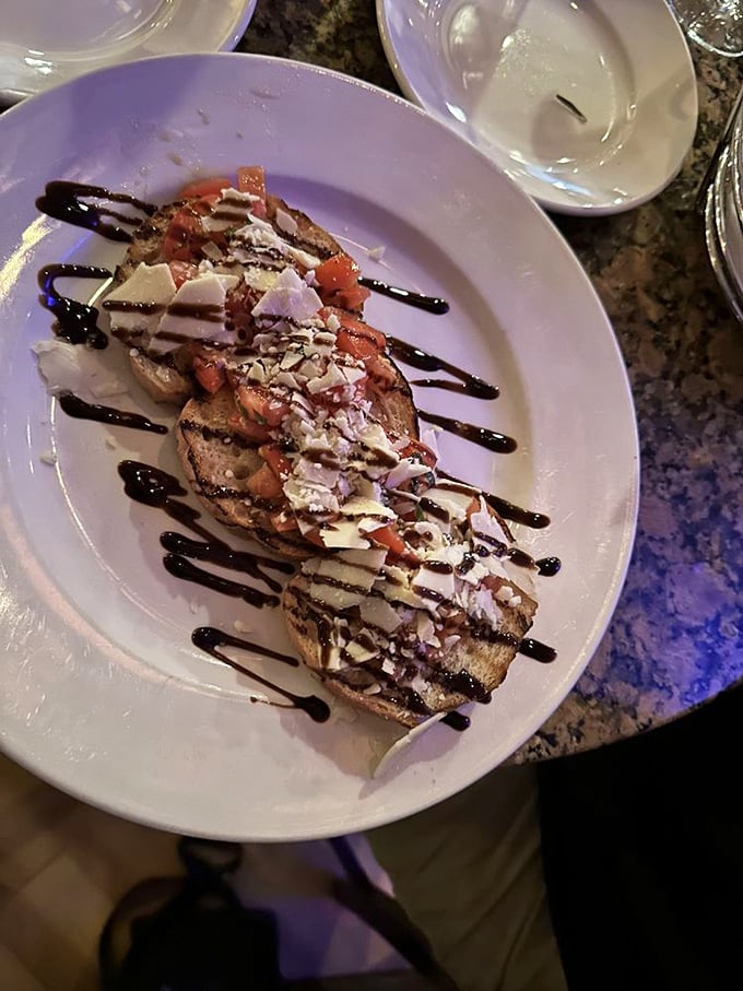 Bruschetta that doesn't whisper "fresh"&mdash;it announces it with a megaphone of bright tomatoes and shaved parmesan.