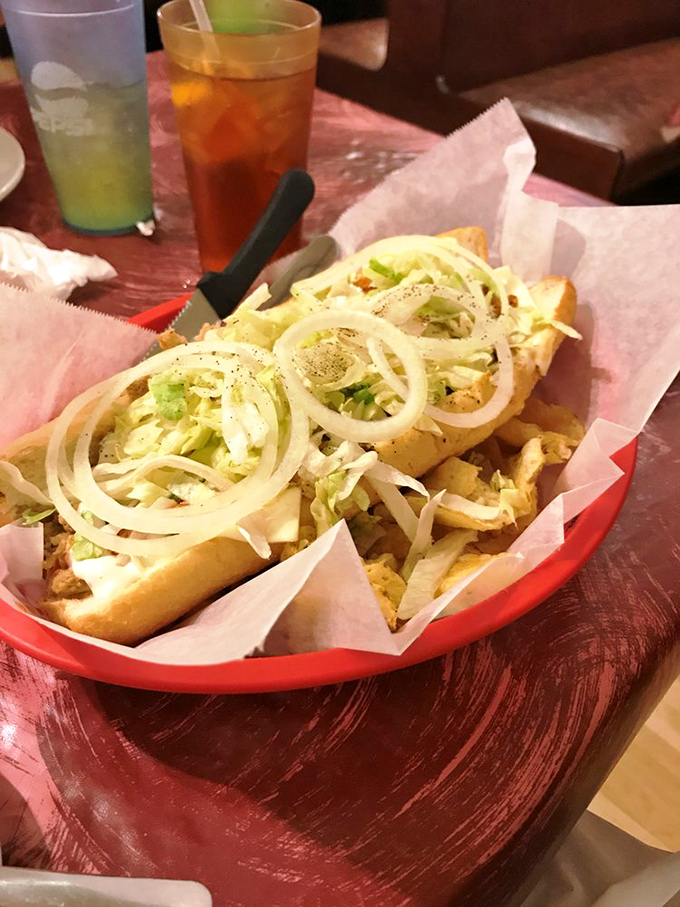 A buffalo chicken cheesesteak that brings the heat and the sweet. Those vibrant red peppers aren't just garnish&mdash;they're flavor fireworks in every bite.