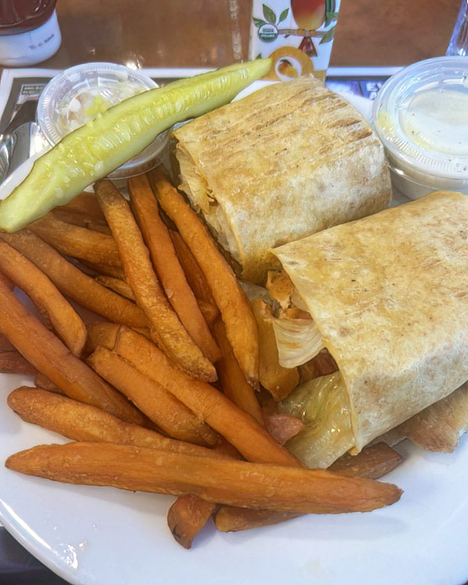This wrap doesn't just contain lunch&mdash;it imprisons flavor in a tortilla fortress, with crispy fries standing guard and coleslaw providing cool reinforcement.