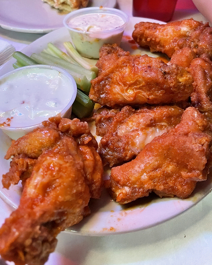 Buffalo wings with the perfect crisp-to-juicy ratio and dipping sauces that make you wonder why you ever bothered with napkins in the first place.
