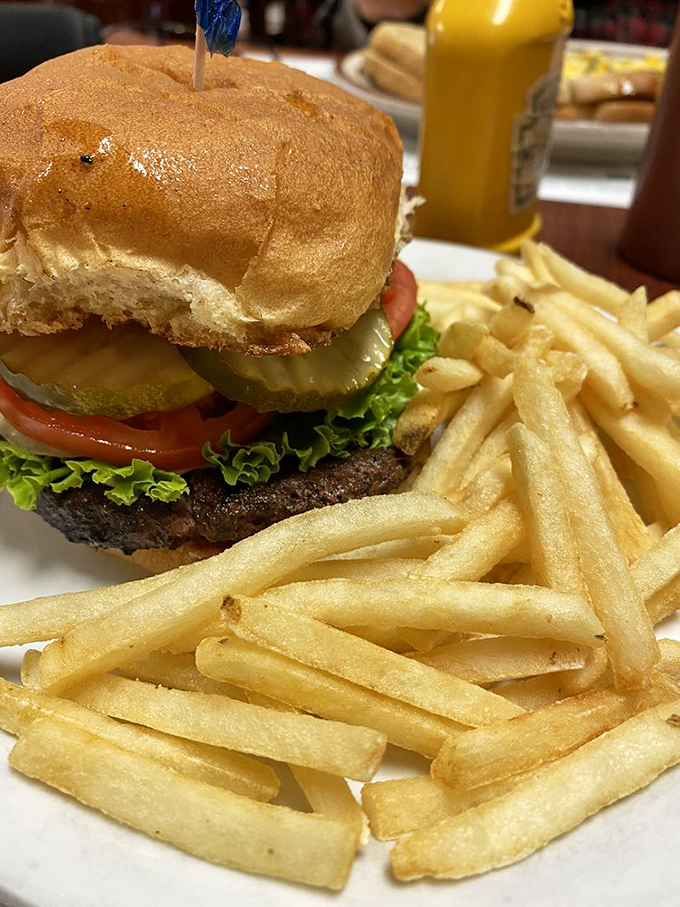 A burger that doesn't need a trendy name or artisanal designation. Those fries look like they've never seen the inside of a freezer. 