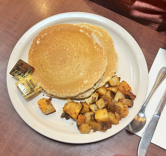 Golden pancakes with a side of those famous Cajun potatoes. Simple perfection that reminds you why breakfast might actually be the most important meal of the day.