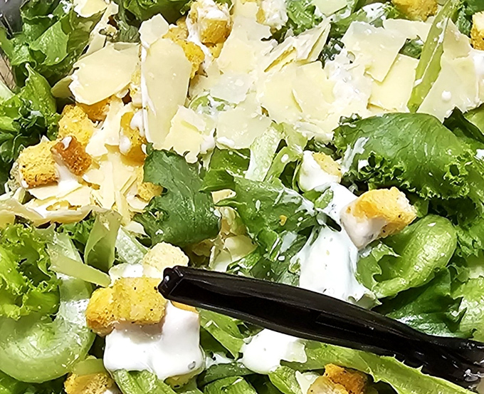 A Caesar salad that doesn't apologize for being the opening act. Fresh greens, shaved cheese, and croutons that actually crunch.
