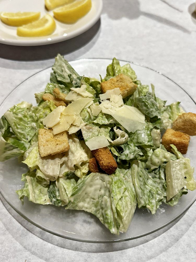 A Caesar salad that Julius himself would approve of—crisp, classic, and ready to support your seafood adventure.