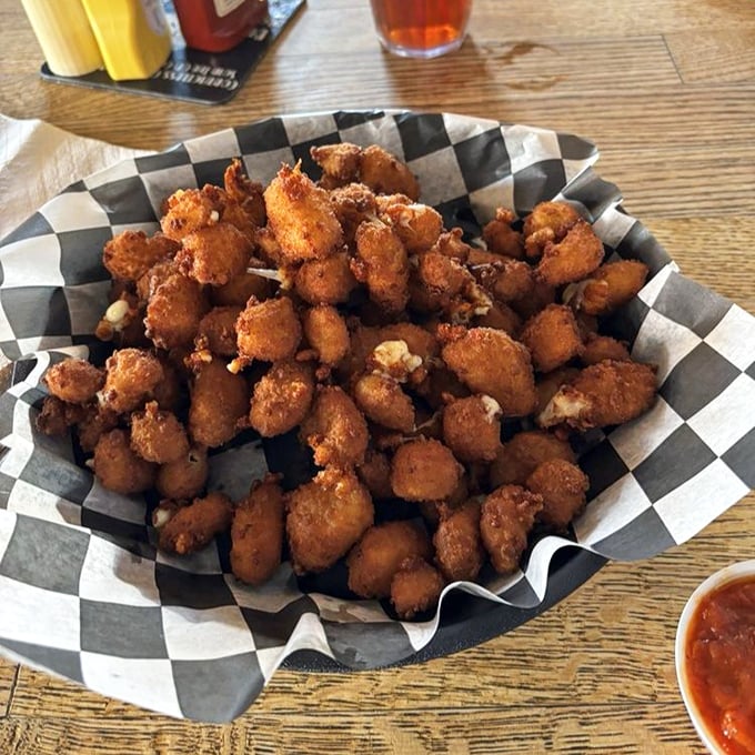 Cheese curds: Wisconsin's gift to humanity. These golden nuggets of joy deliver that signature squeak-between-your-teeth sensation that true curd connoisseurs live for.