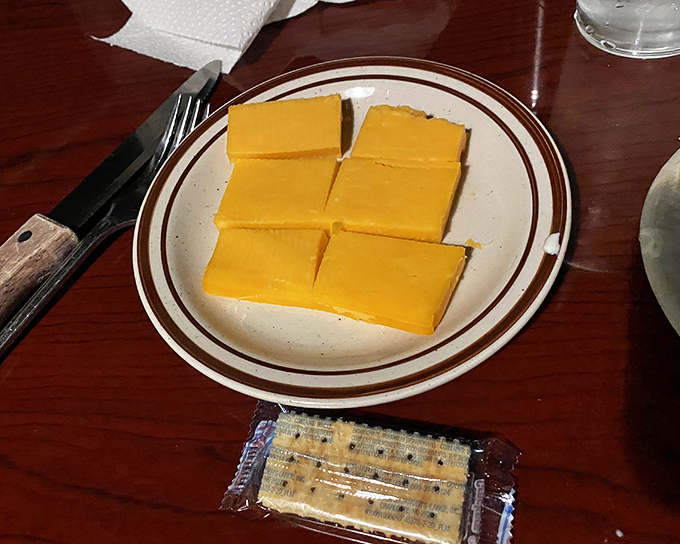 Some traditions never need updating&mdash;slices of cheddar with crackers arrive as a simple prelude to the meaty main event.