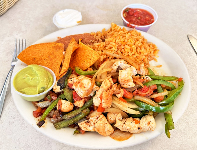 Fajitas that sizzle with personality&mdash;tender chicken, vibrant peppers, and all the fixings that turn dinner into a build-your-own adventure.