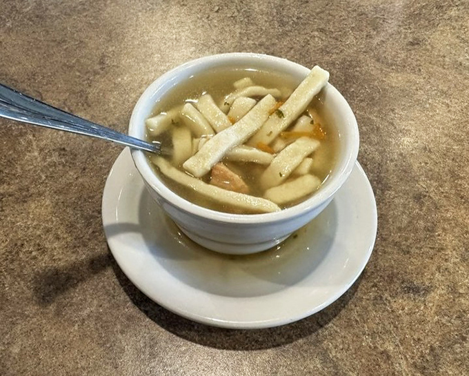 Chicken noodle soup that could cure anything from a cold to a bad day&mdash;those thick noodles are swimming in liquid comfort.