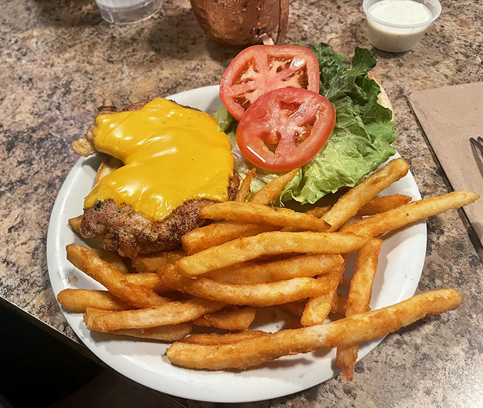 Even the humble cheeseburger gets the Mike's treatment—juicy, perfectly melted cheese, and those fries that haunt your dreams for weeks.