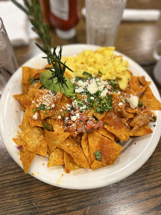 Chilaquiles that look like they've been blessed by both Mexican grandmothers and modern food stylists&mdash;comfort food with a college degree.