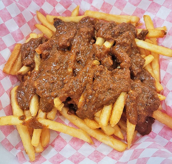 Chili cheese fries that laugh in the face of diet plans. A glorious mess that requires both fork and commitment&mdash;worth every napkin.