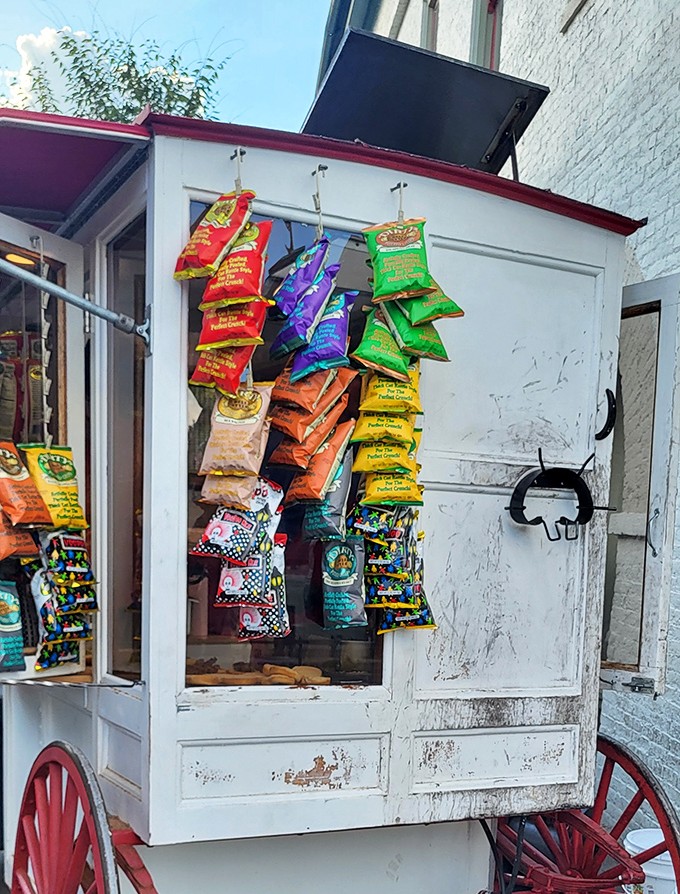 Colorful chip bags dangle like edible ornaments, ready to complement your burger experience. The potato chip Christmas tree of snack dreams.