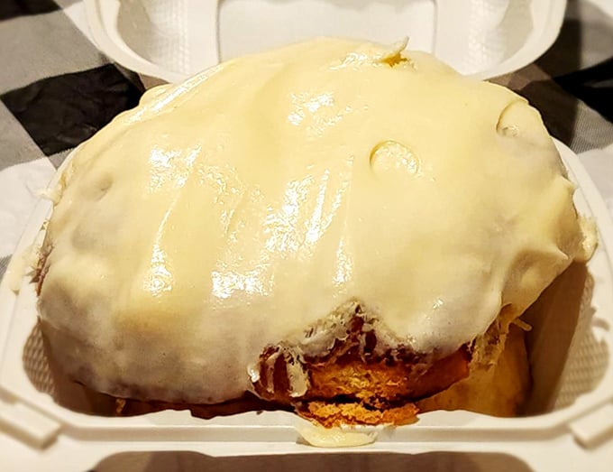 This cinnamon roll isn't just breakfast&mdash;it's dessert masquerading as a morning meal, wearing a cream cheese disguise that fools absolutely no one.