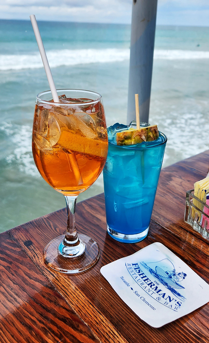 Cocktails with a view that's worth the price of admission alone. That blue concoction might just match the Pacific's perfect hue.