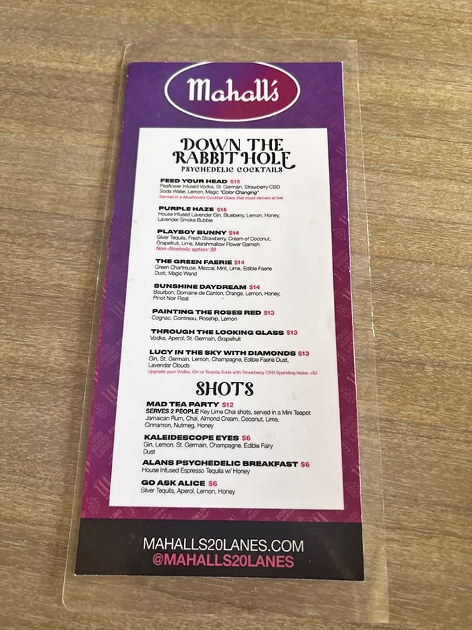 "Down the Rabbit Hole" isn't just where your bowling ball disappeared—it's Mahall's psychedelic cocktail menu featuring drinks like Purple Haze and Lucy in the Sky with Diamonds.