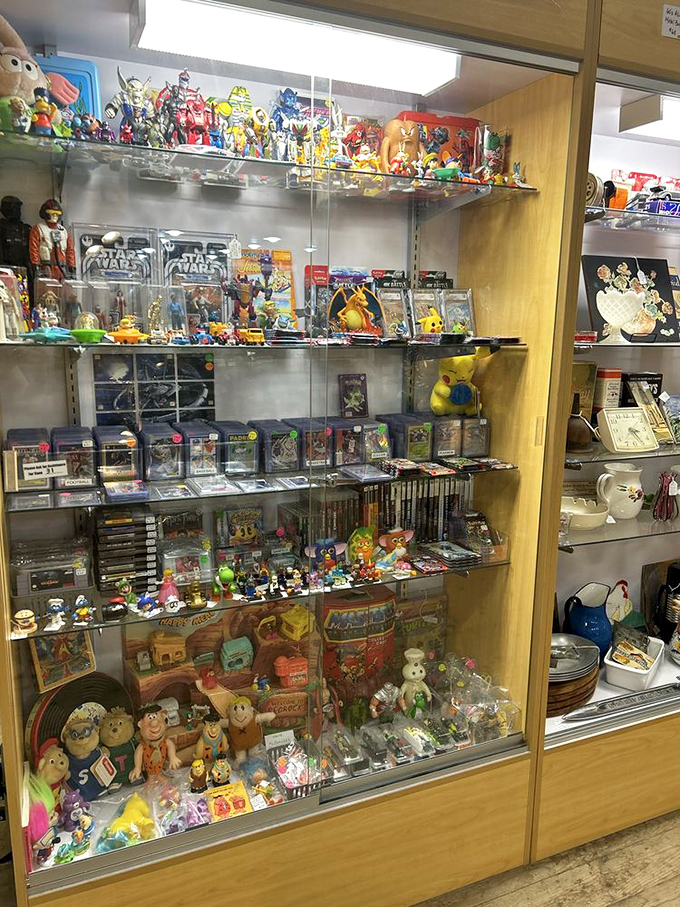 Action figures and vintage toys lined up like they're auditioning for Toy Story 5: The Antique Mall Chronicles.
