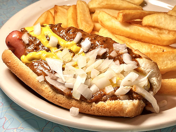 A proper Coney dog loaded with the works&mdash;proof that sometimes the messiest foods create the cleanest joy.