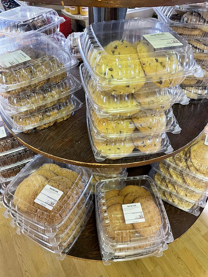 Cookie containers stacked like delicious Jenga towers. One wrong move and you're legally obligated to eat all the fallen soldiers.