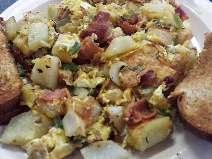 Corned beef hash and eggs transform breakfast into an event worthy of celebration, served with golden toast.