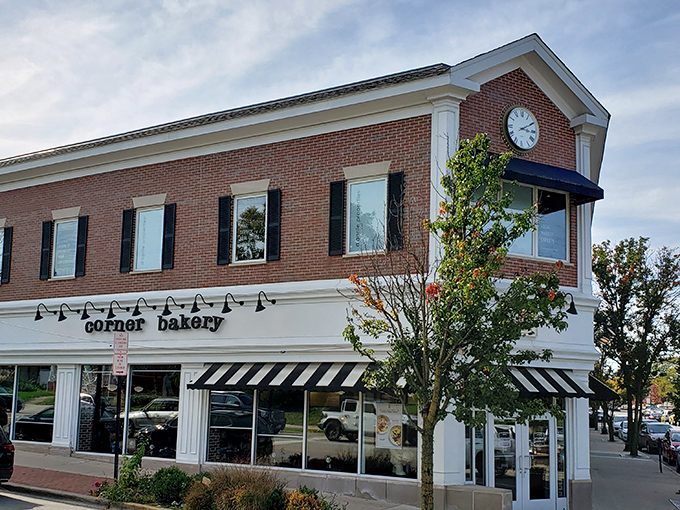 Corner Bakery's striped awnings practically wink at passersby, promising coffee and pastries worth every delicious calorie.