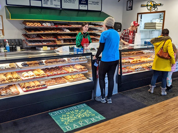 Happy customers proving that donuts are indeed the universal language of morning contentment.