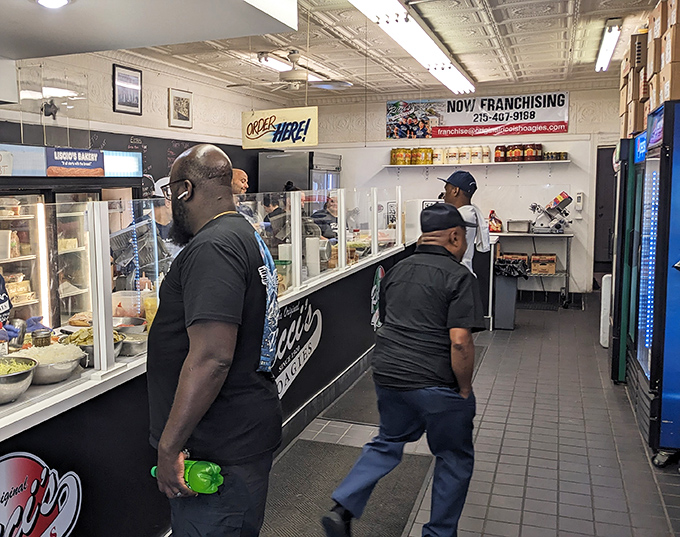 The sandwich assembly line where hoagie magic happens &ndash; like watching Picasso paint, if Picasso worked exclusively in cold cuts.