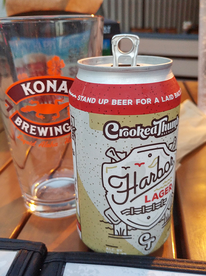 Nothing complements smoky BBQ like a crisp craft beer. This Harbor Lager from Crooked Thumb Brewery stands ready for duty.