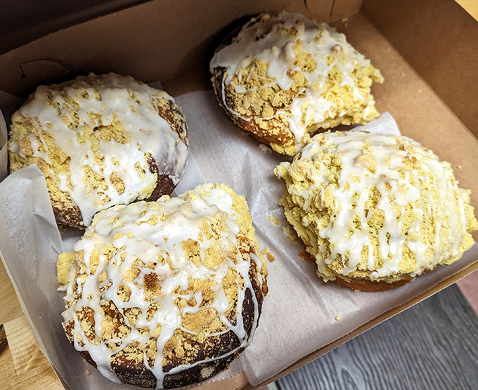 Crumb buns that look like they escaped from someone's favorite grandmother's kitchen counter this very morning.