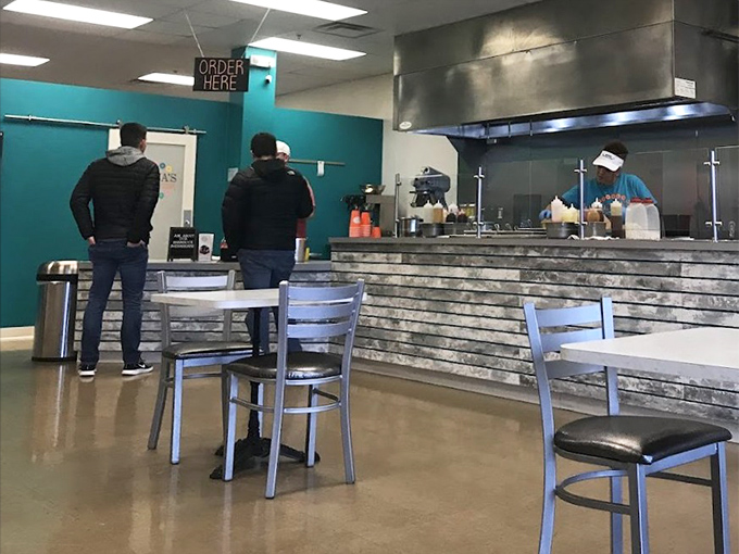 The ordering counter where life-changing decisions are made daily: "Should I get six different donuts or six of the same one?" 