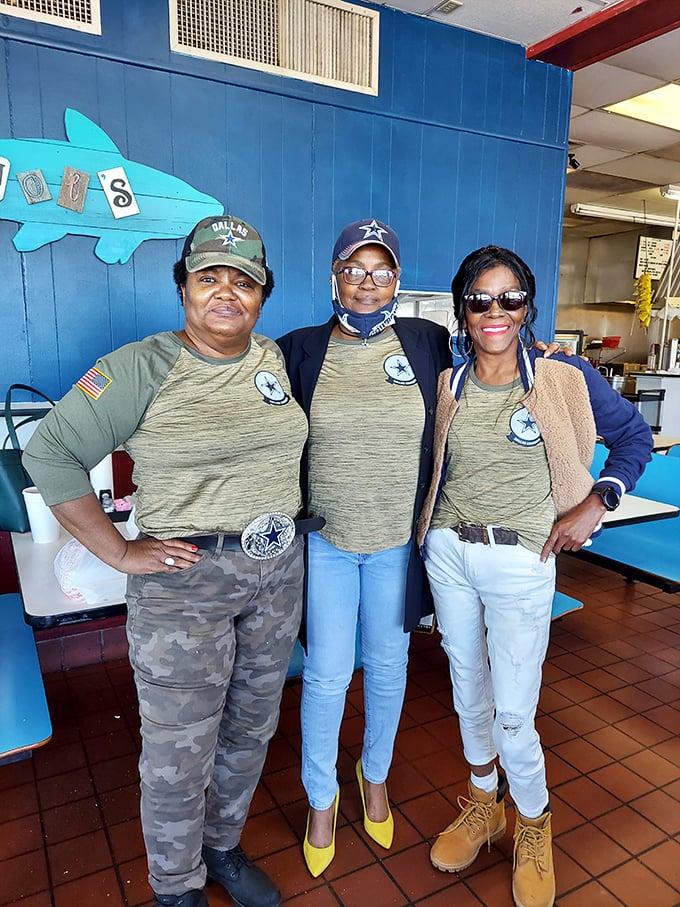 The heart of Joe's&mdash;staff sporting matching Dallas Cowboys gear and smiles that say "we know our food is about to make your day."