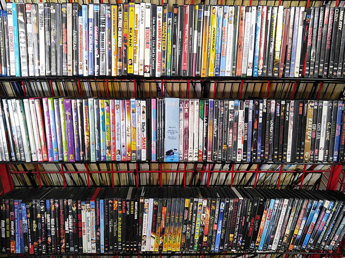 The DVD wall&mdash;a nostalgic reminder of life before streaming, when movie night meant actually leaving the house first.