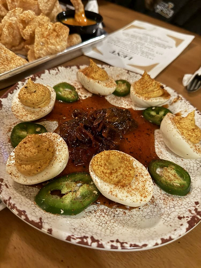 Deviled eggs elevated to art form&mdash;spiced, smoked, and surrounded by jalape&ntilde;os. Grandma's recipe just got a smoky makeover that would make the devil proud.