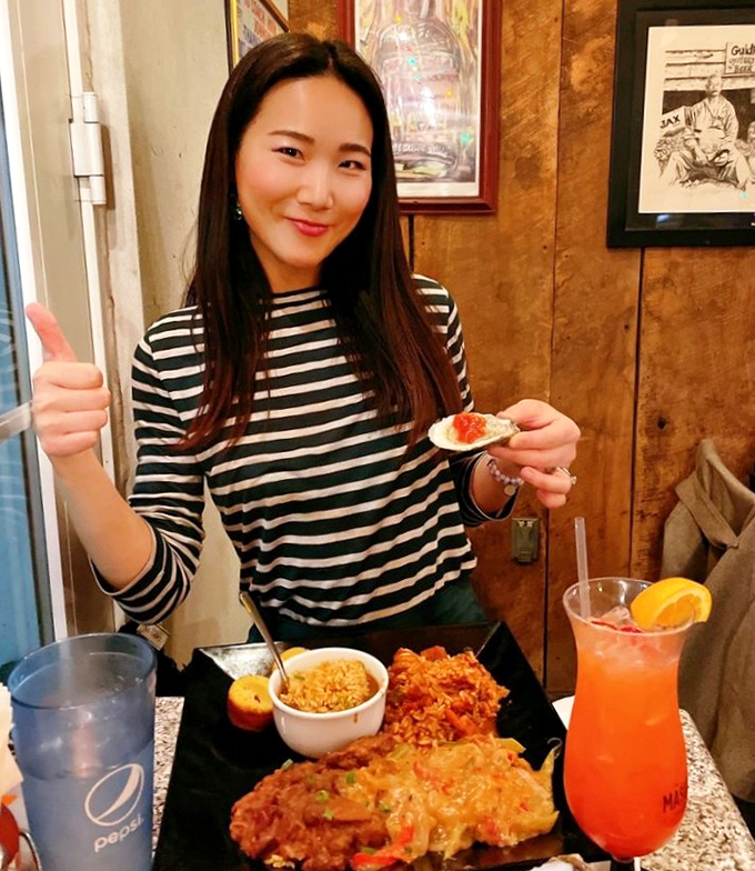 Happy diners, delicious spread, thumbs up&mdash;the universal language of "you need to eat here right now." 